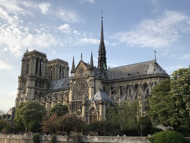 Notre dame de Paris stock image. Image of side, clouds - 124284893