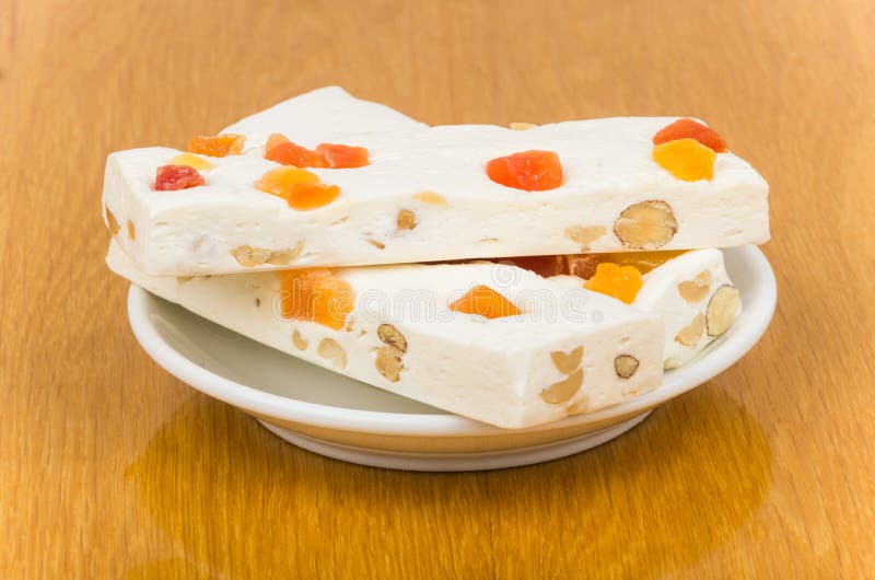Nougat with Nuts and Dried Fruits in Plate Stock Image - Image of ...