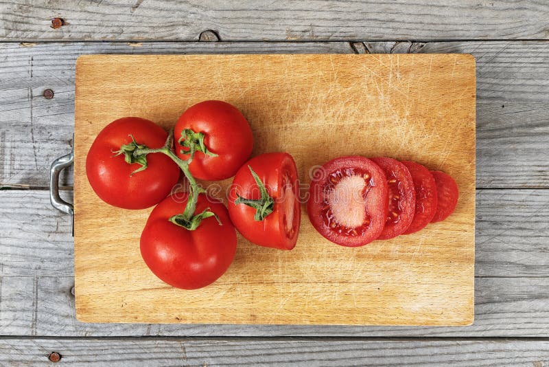 Tomate coupée en tranches photo stock. Image du sain, produit - 1465970