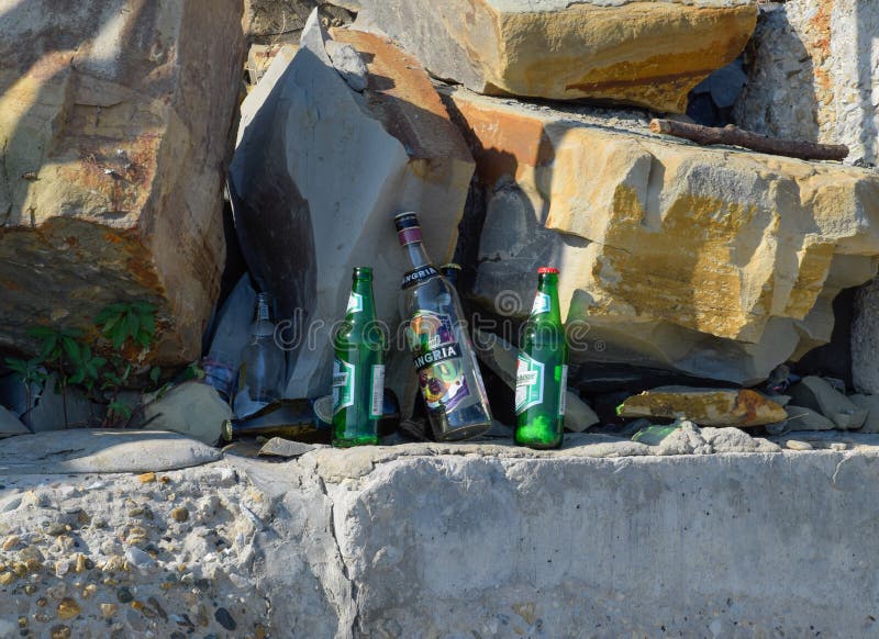 Empty Bottles of Alcohol. People Left Garbage. the Beach of ...