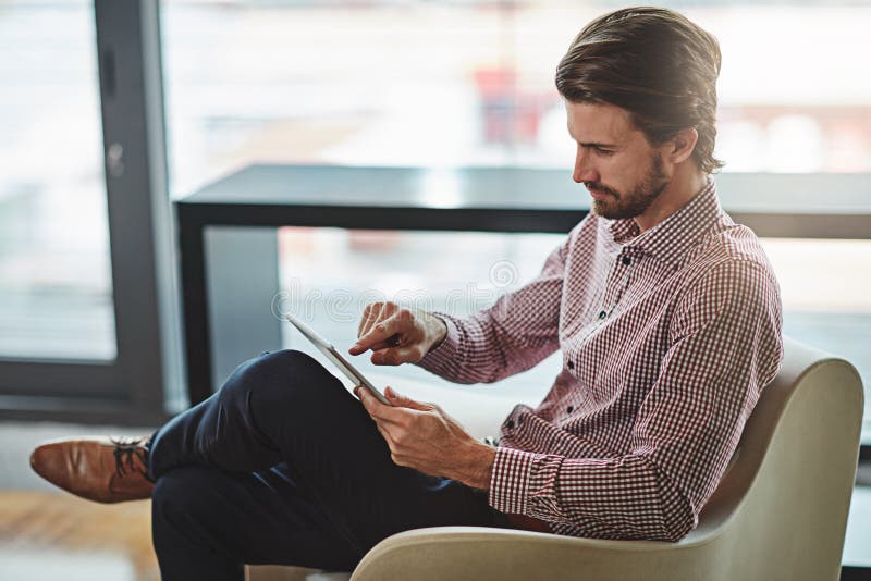 Now Hes Able To Work from Anywhere. a Handsome Young Businessman Using ...