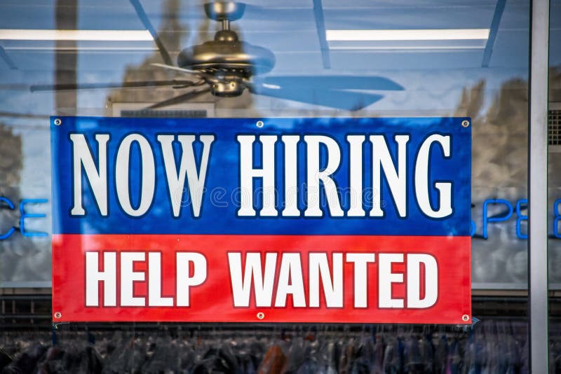Now Hiring Help Wanted Sign in Window of Business with Ceiling Fan ...