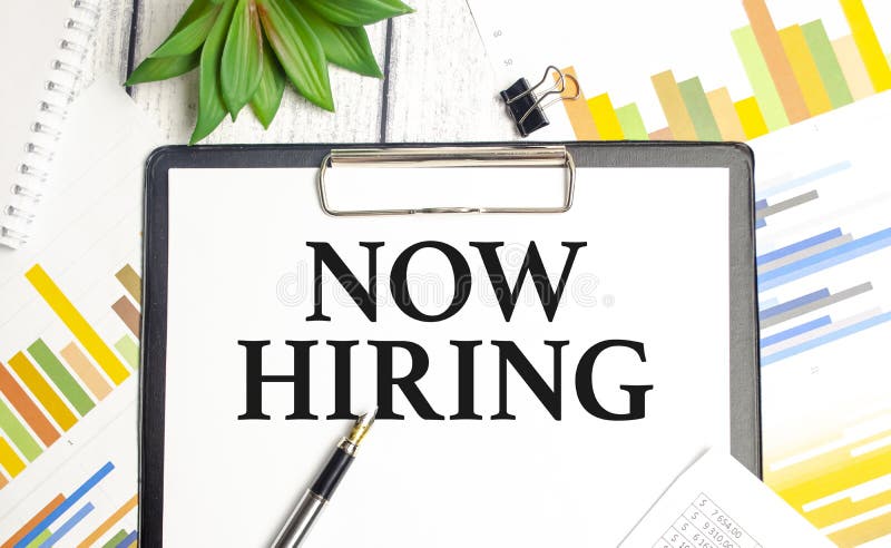 Now Hiring Words on Paper Folder and Charts Stock Photo - Image of ...