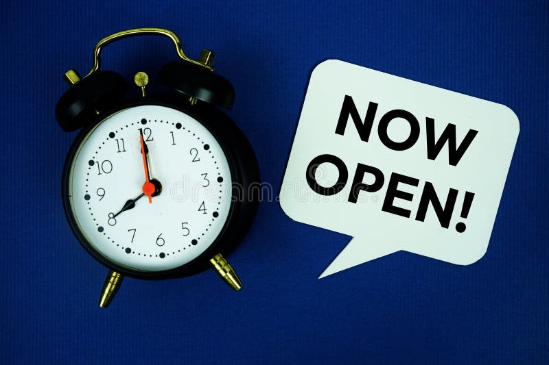 Now Open Text on Speech Bubble with Alarm Clock Top View on Blue ...