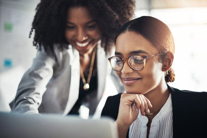 Now Thats Just the Solution we Need. Two Businesswomen Working Together ...