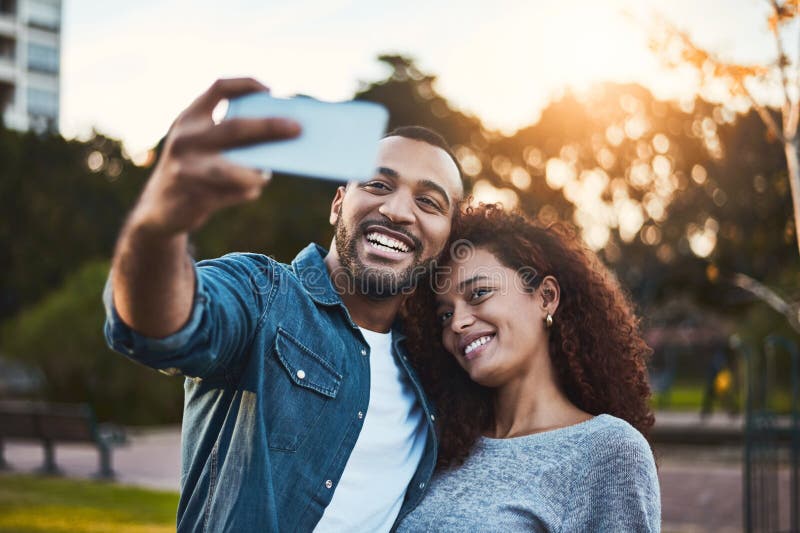 Now Well Never Forget This Day A Young Couple Taking Selfies Together