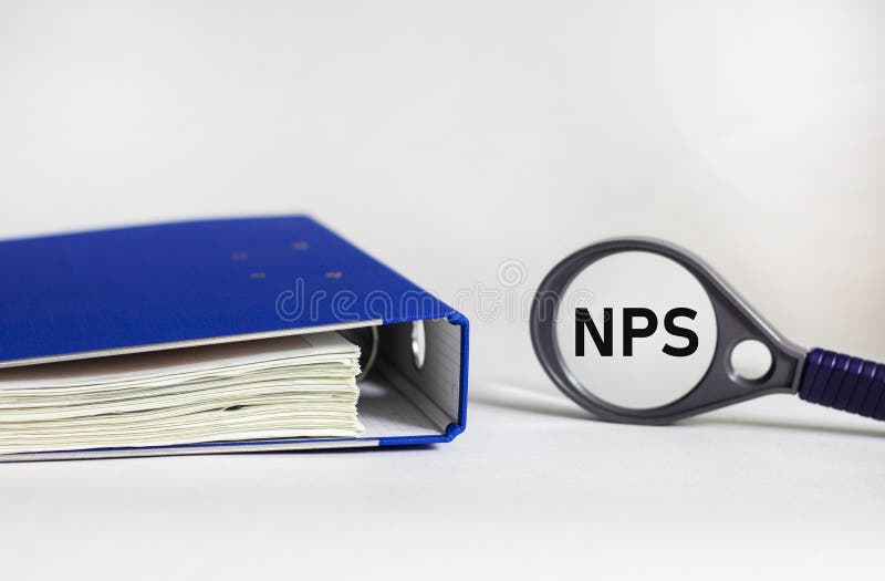 NPS Concept on Magnifying Glass on White Background with Blue Folder ...