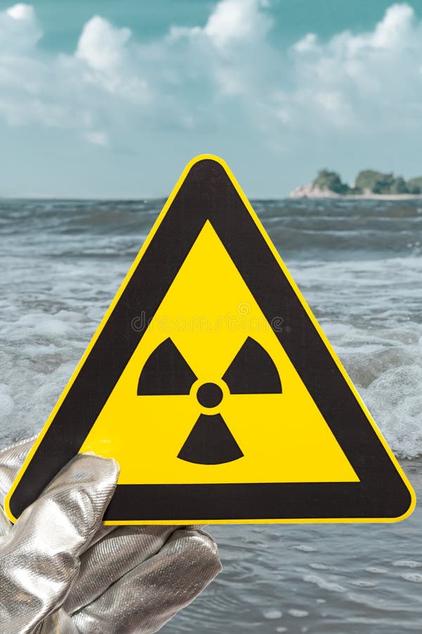 A Nuclear Radiation Warning Sign in Front of an Ocean Vertical ...