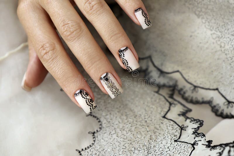 Nude Manicure with Graphic Patterns and Rhinestones. Stock Image ...