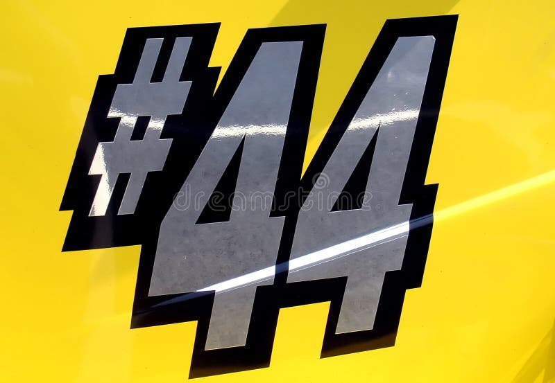 Number 44 on Side of Racing Car Stock Photo - Image of shiny, yellow ...