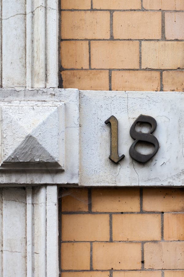 Number 18 Antique House Number on Brick Wall Stock Photo - Image of ...