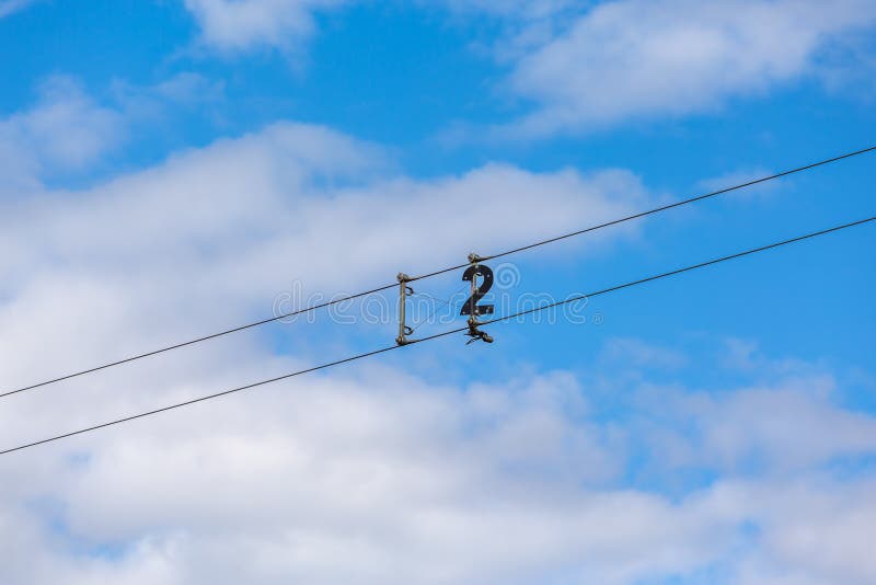 Number 2 on a Background of Blue Sky with White Clouds Stock Photo ...