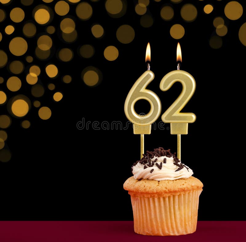 Number 62 Birthday Candle - Cupcake on Black Background with Out of ...