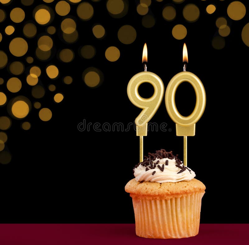 Number 90 Birthday Candle - Cupcake on Black Background with Out of ...