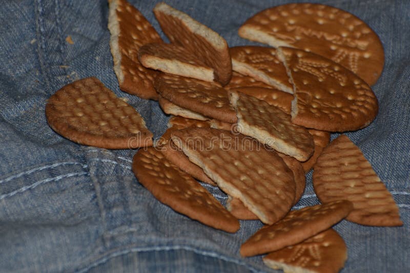 Number of Biscuits Broken into Two Halves, with the Background of Blue ...
