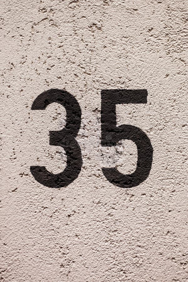 Number 35 Black Painted House Number on White Wall Stock Image - Image ...