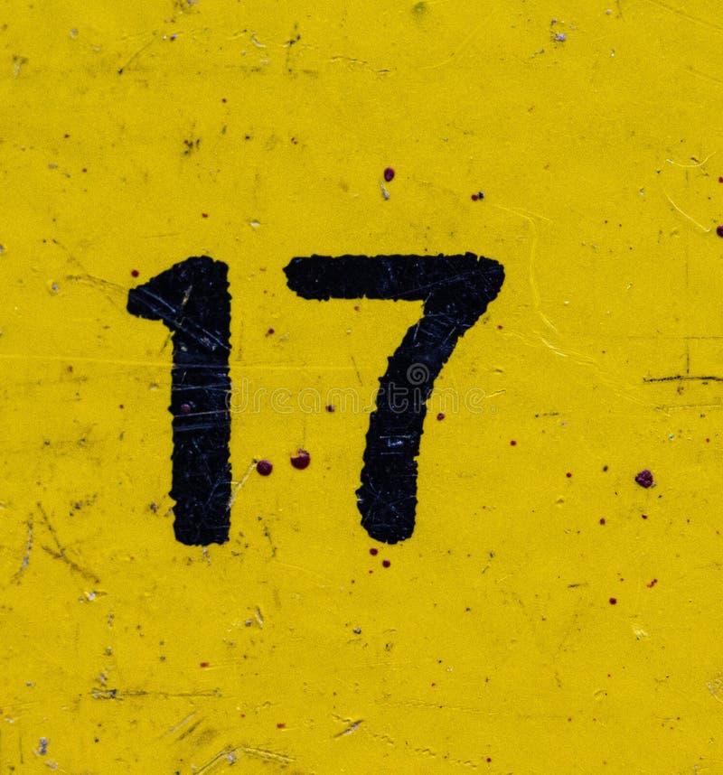 The Number 17 is Black on a Yellow Background. Grunge Style, Scratches ...
