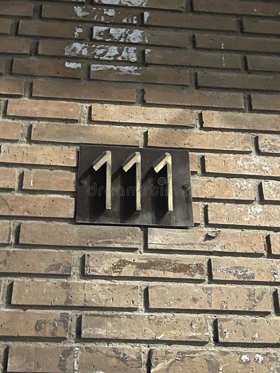 Number 111 on the Wall of the Building Stock Photo - Image of address ...