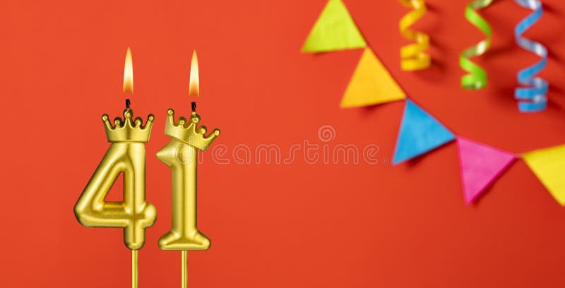 Number 41 Candle - Birthday Celebration on an Orange Background with ...