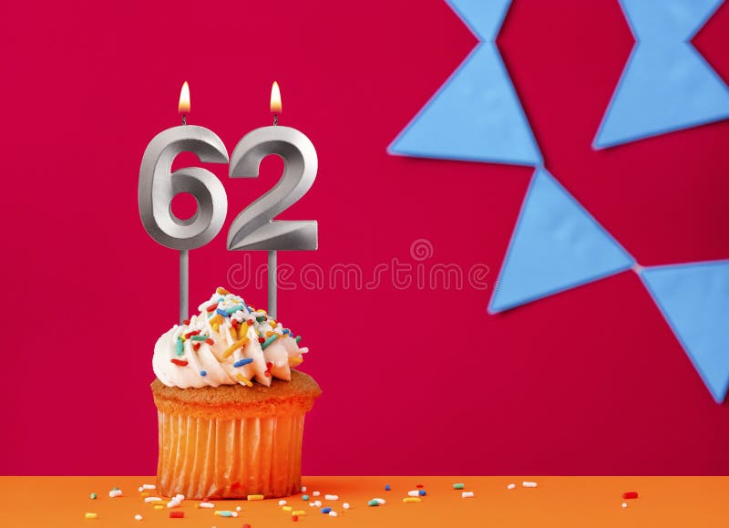 Number 62 Candle with Birthday Cupcake on a Red Background with Blue ...