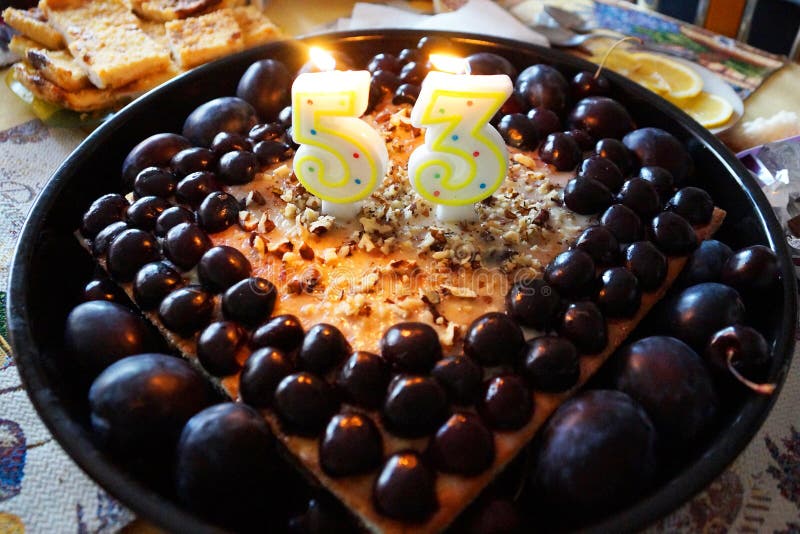 Number 53 from Candles on a Fruit Cake with Cherries Stock Photo ...