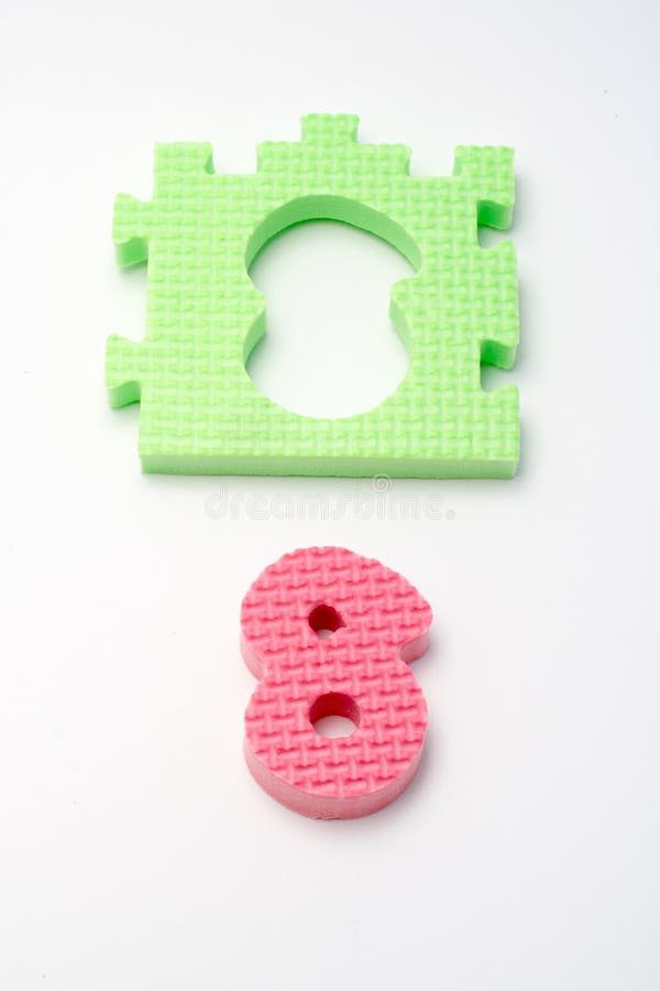 Number Eight Puzzle Mats. Focus on the Front (small DOF) Stock Photo ...