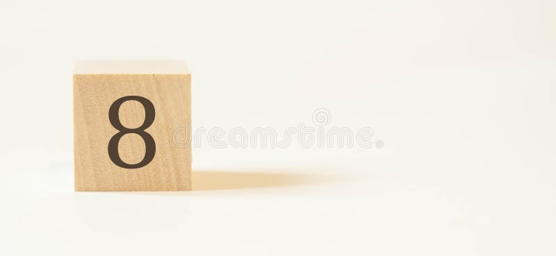 Number Eight on a Wooden Cube with a White Background Stock Photo ...