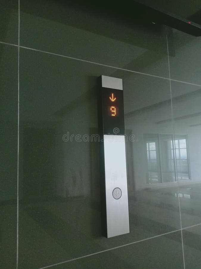 Number 9 in the elevator stock image. Image of white - 264870033
