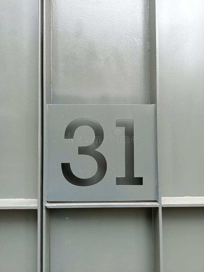 Number 31 is Engraved on the Steel Plate Stock Photo - Image of ...