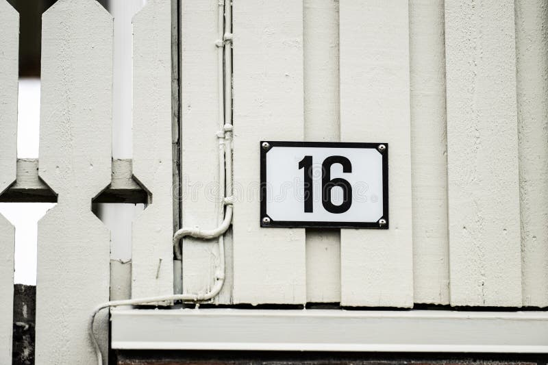 Number 16 on the Facade of a Baige House.. Stock Photo - Image of ...