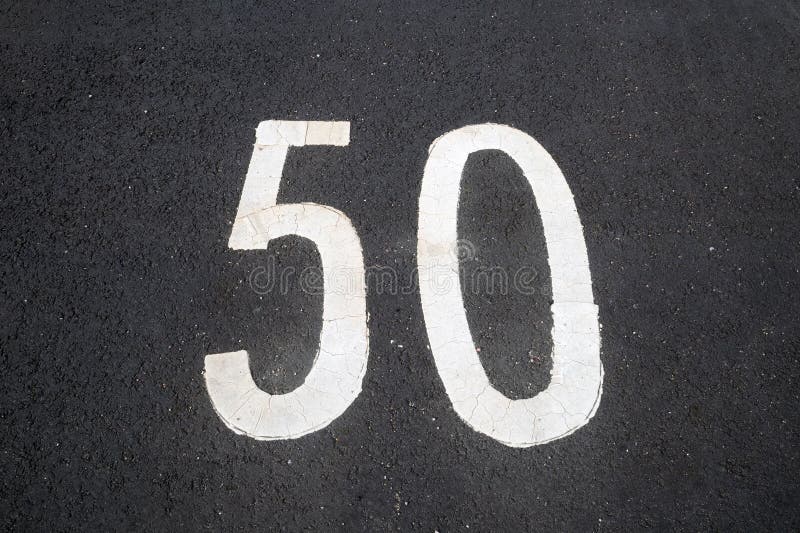 Number Fifty 50 Painted in White on Tarmac Stock Photo - Image of sign ...