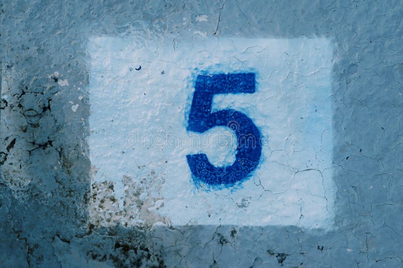 Number Five Painted on a Blue Mud-stained Wall in a White Rectangle ...