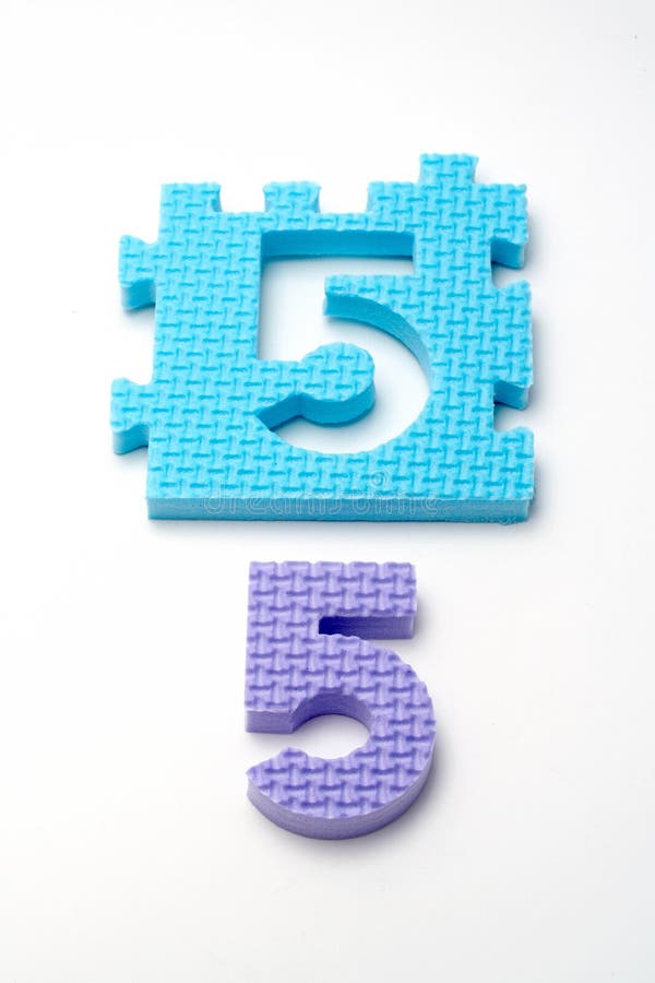 Number Five Puzzle Mats. Focus on the Front (small DOF) Stock Photo ...