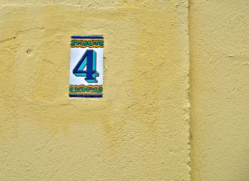 Number 4, Four, a Tile on a Yellow Wall. Stock Image - Image of count ...