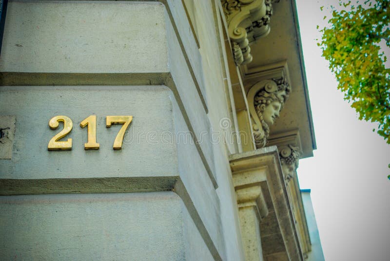 Number 217 on a French Building in Gold Stock Photo - Image of ...
