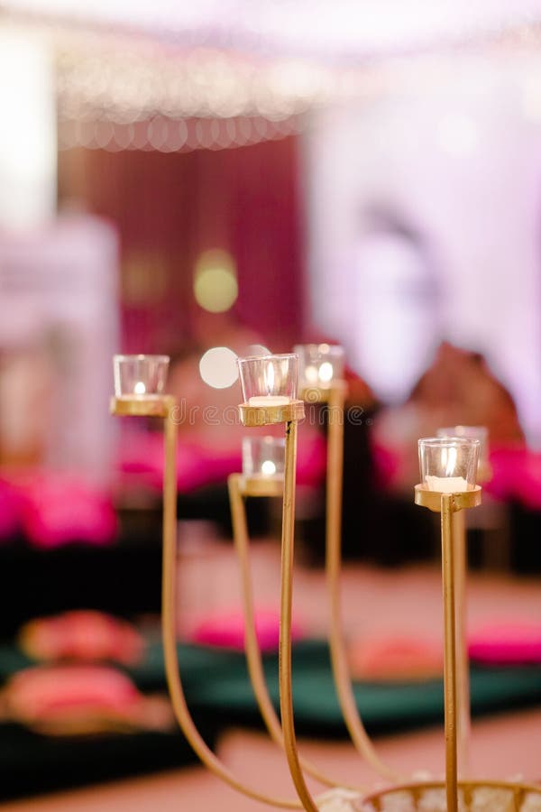 Number of Glass Cups Containing Multiple Candles on a Table Stock Image ...