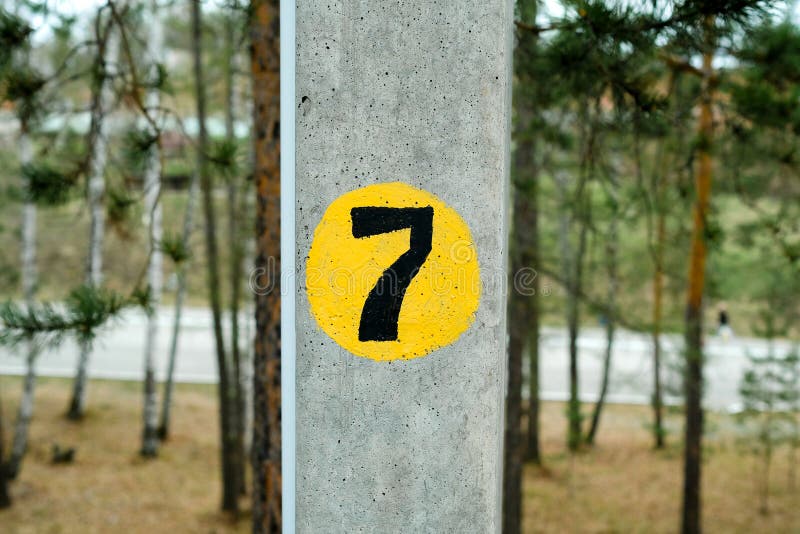 The Number 7 On The Gray Pillar Is Painted With Paint Stock Image ...
