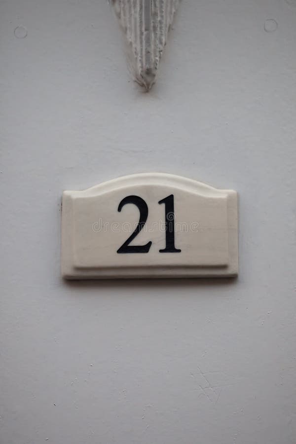 Number 21 House Number Sign on White Wall Stock Image - Image of wall ...