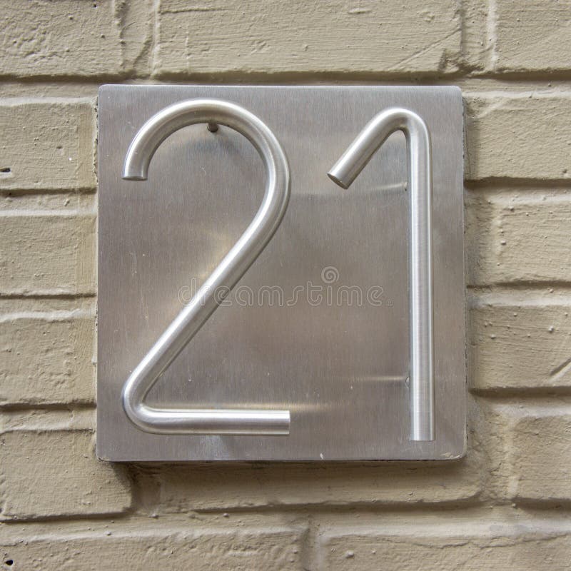 House Number 21 stock photo. Image of bricks, aluminum - 141233558