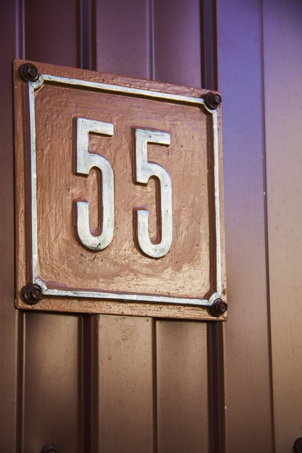 Number 55 on a wall stock photo. Image of fifty, numbering - 10034072