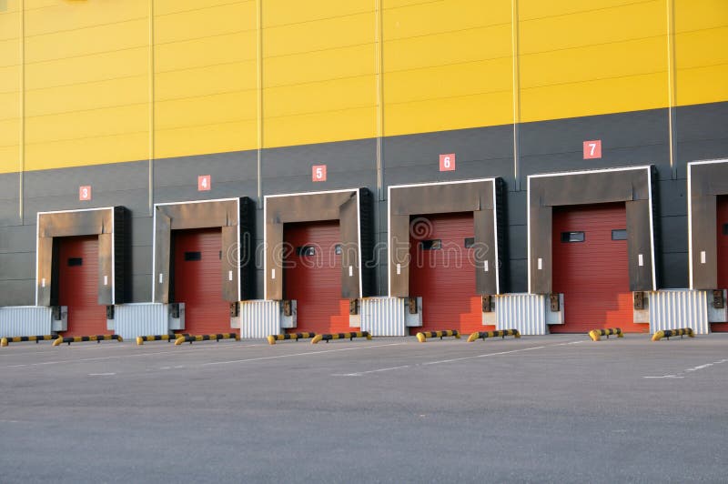 A Number of Loading Docks. Modern Warehouse Building Stock Photo ...