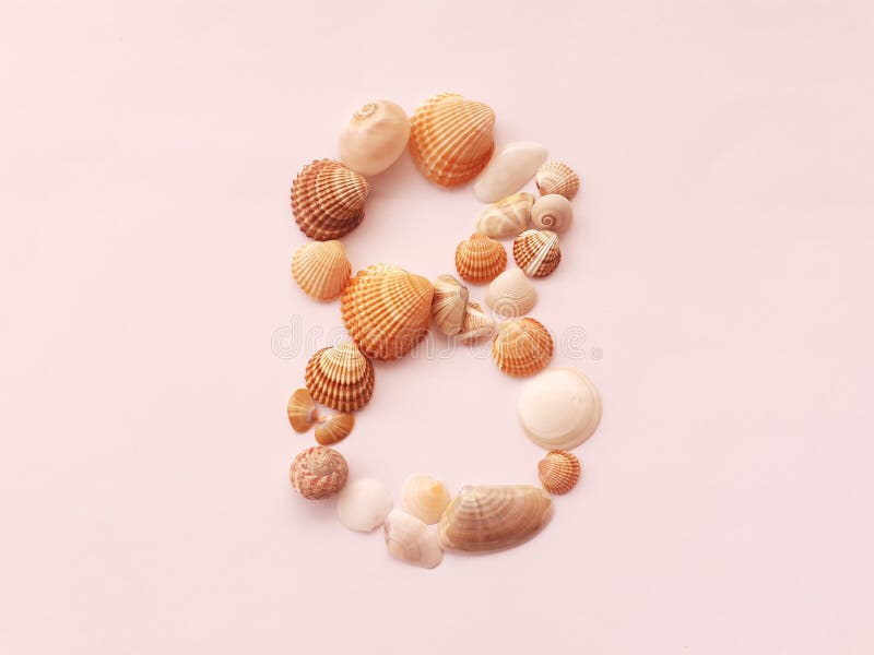 Number 8 Made from Toy Crowns and Lips on a White Isolated Background ...