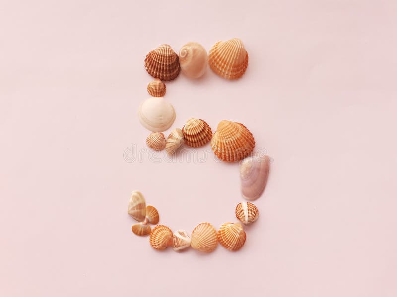 Number 8 Made from Toy Crowns and Lips on a White Isolated Background ...