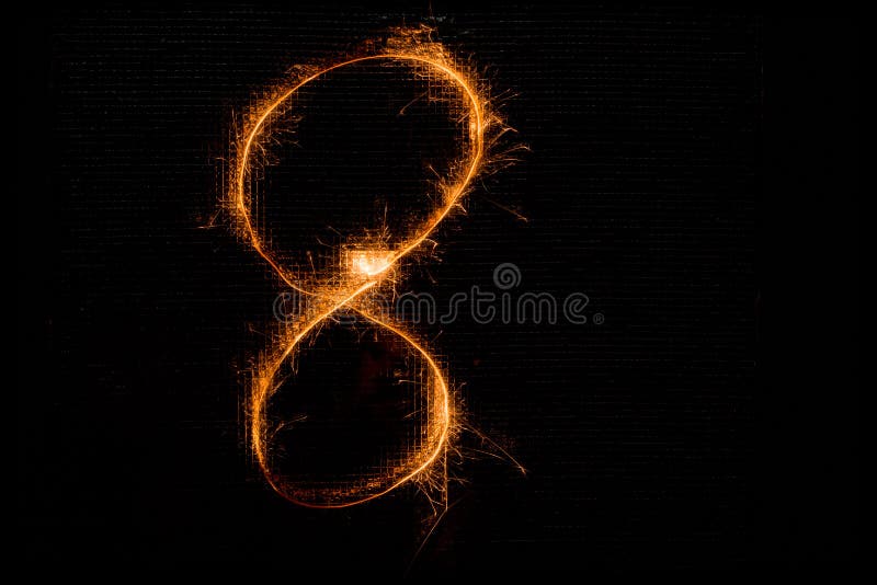 Number 8 Made of Sparklers on Black Stock Photo - Image of number ...