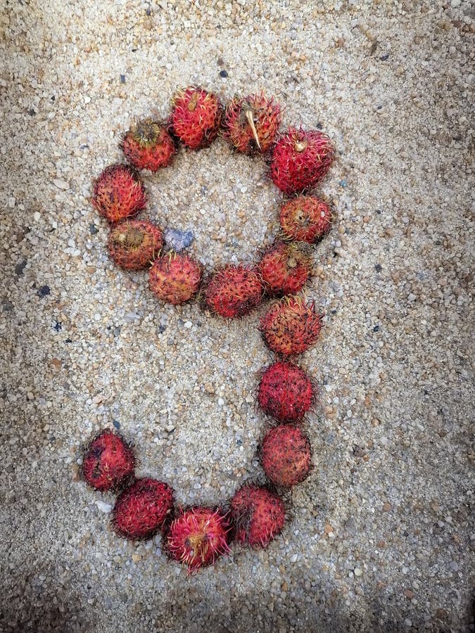 The Number Nine is Laid Out from the Peel of a Red Fruit Stock Image ...