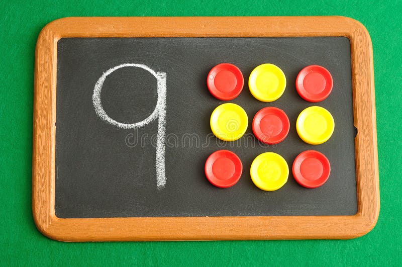 A Number Nine Written on a Black Board Stock Image - Image of wooden ...