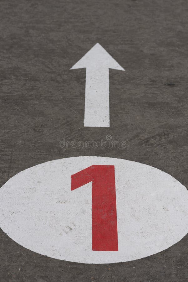 Number 1 One and Arrow Painted on Concrete Stock Photo - Image of sign ...