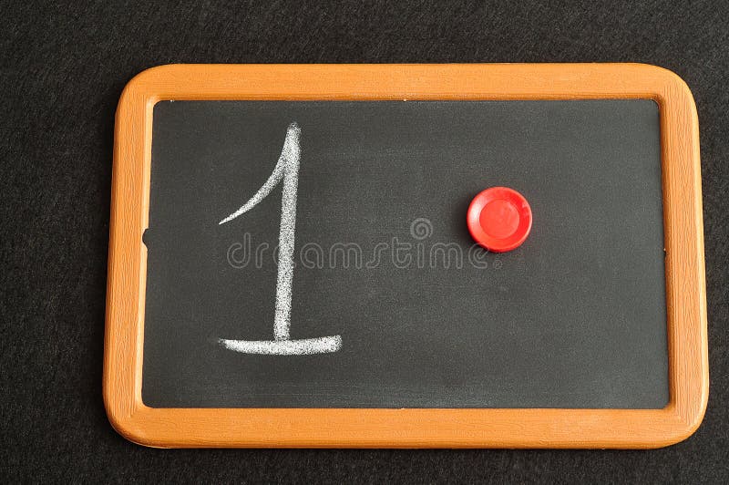 A Number One Written on a Black Board Stock Image - Image of classroom ...