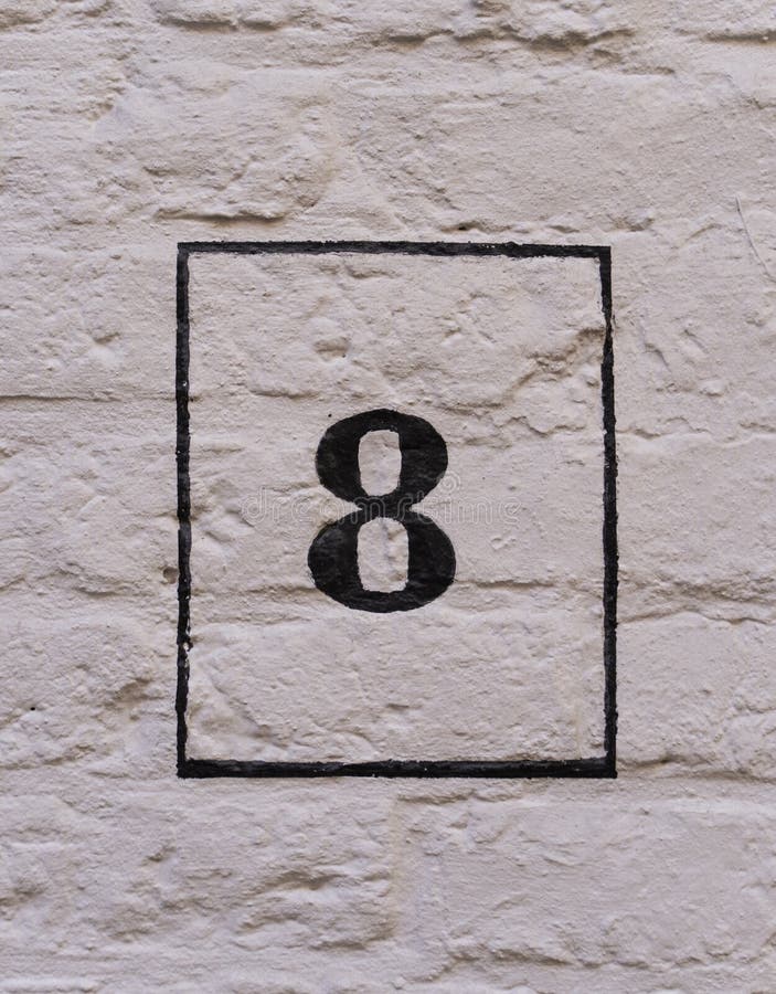 Number 8 Painted on the White Brick Wall Stock Image - Image of object ...