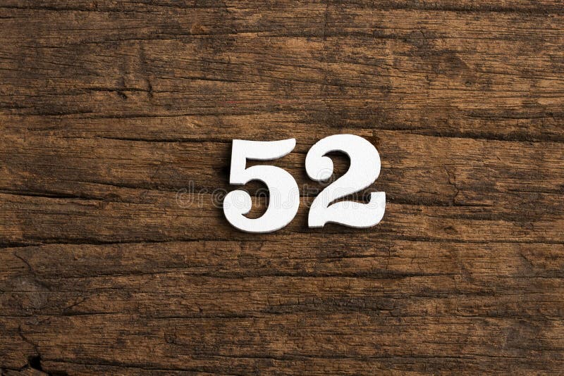 Number 52 - Piece on Rustic Wood Background Stock Image - Image of font ...
